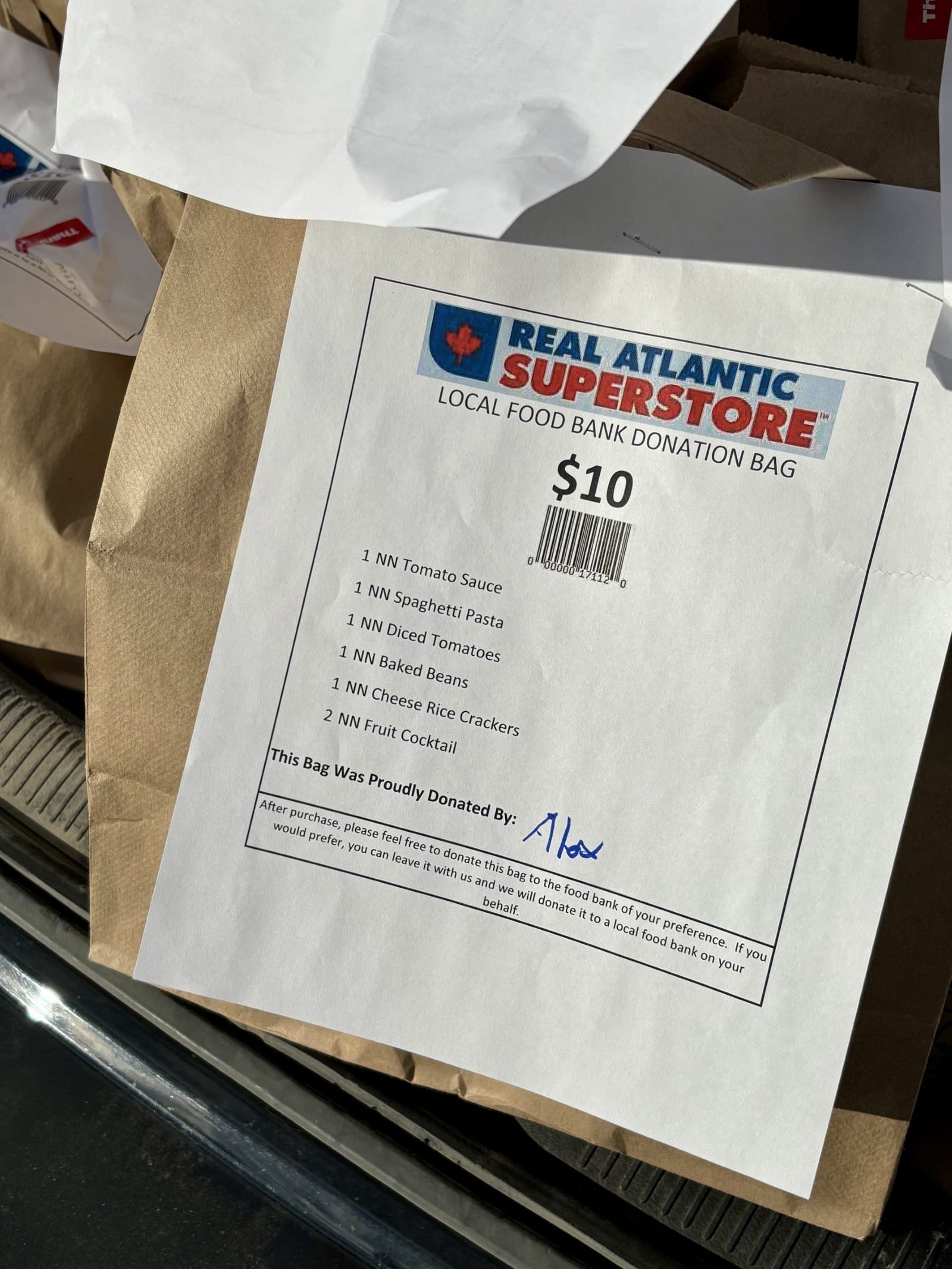Shoppers help store, police ‘Cram a Cruiser’ for food bank | River ...